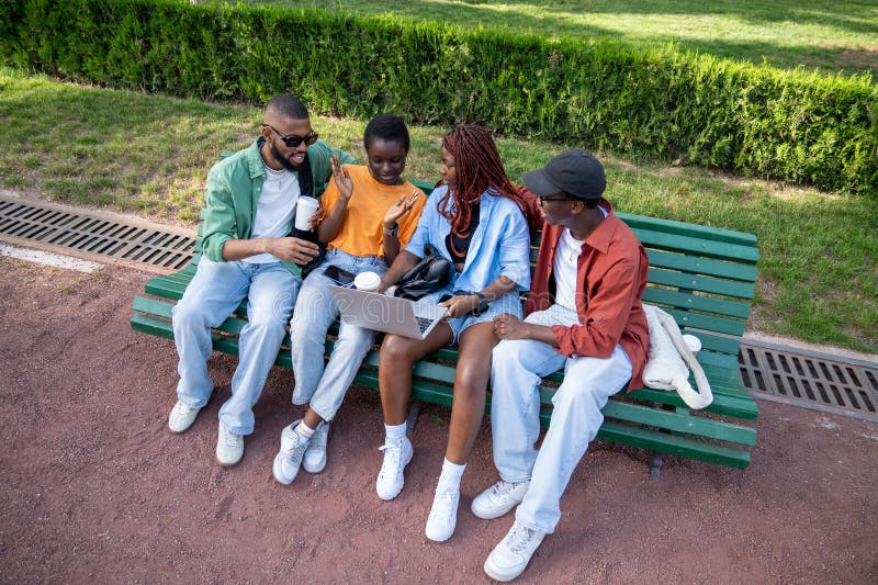 African American Students Focused Look at Screen Laptop Sit on Campus ...