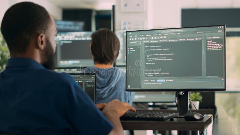 African American System Engineer Working on Software Development with ... African American System Engineer Working on Software Development with ...