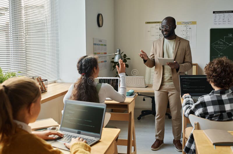 Teacher Teaching Children at Class Stock Photo - Image of elementary ...