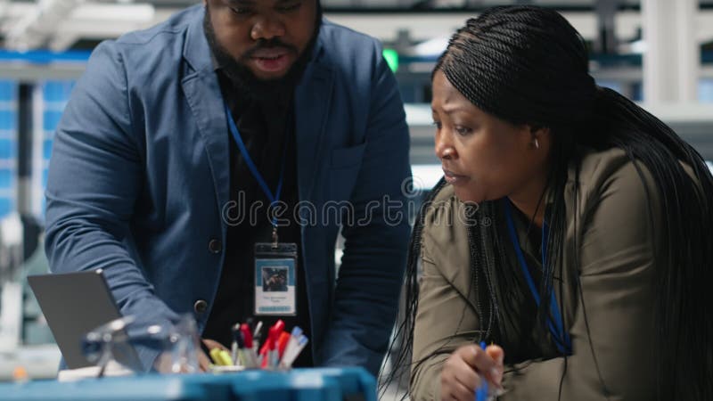 African American Team of Technical Experts Work in High Tech Power ...