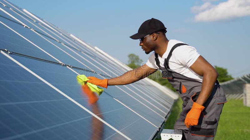 African American Technician are Cleaning Solar Panel Stock Video ...