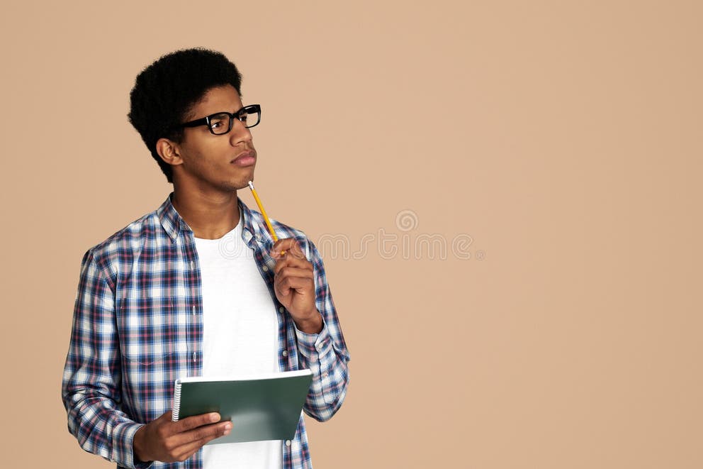 African-American Thoughtful Nerd Thinking about Test in Studio Stock ...
