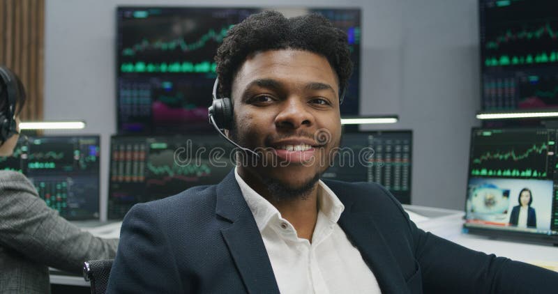 African American Trader Analyzes Market Charts Stock Photo - Image of ...