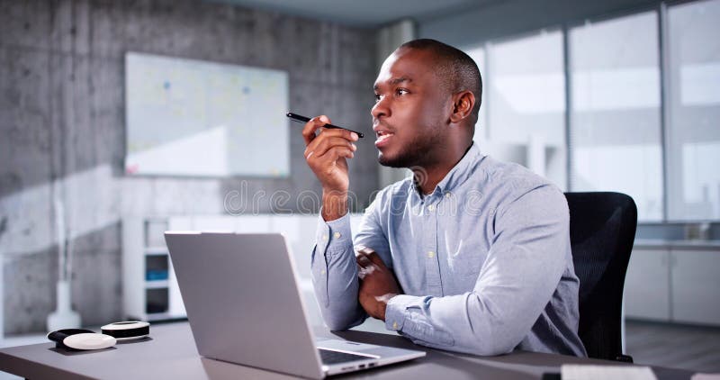 African American Using Online Time Sheets on Computer Stock Photo ...