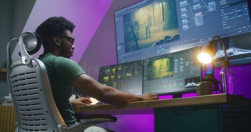 African American Video Editor Makes Color Grading on PC Stock Photo ...
