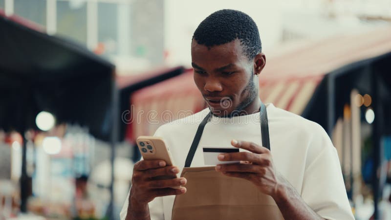 Portrait Of African American Man Waiter Standing With Crossed Arms By