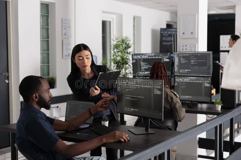 African American Web Developer Using Computer To Write Code And Develop Algorithm Program Stock