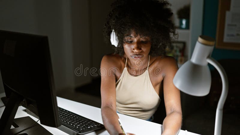 African American Woman Business Worker Using Computer and Headphones ...