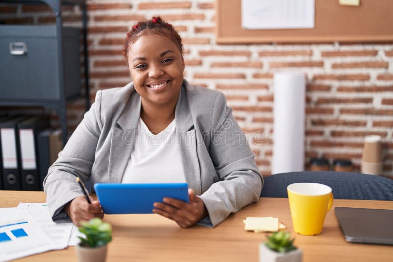 African American Woman Business Worker Using Touchpad Working at Office ...