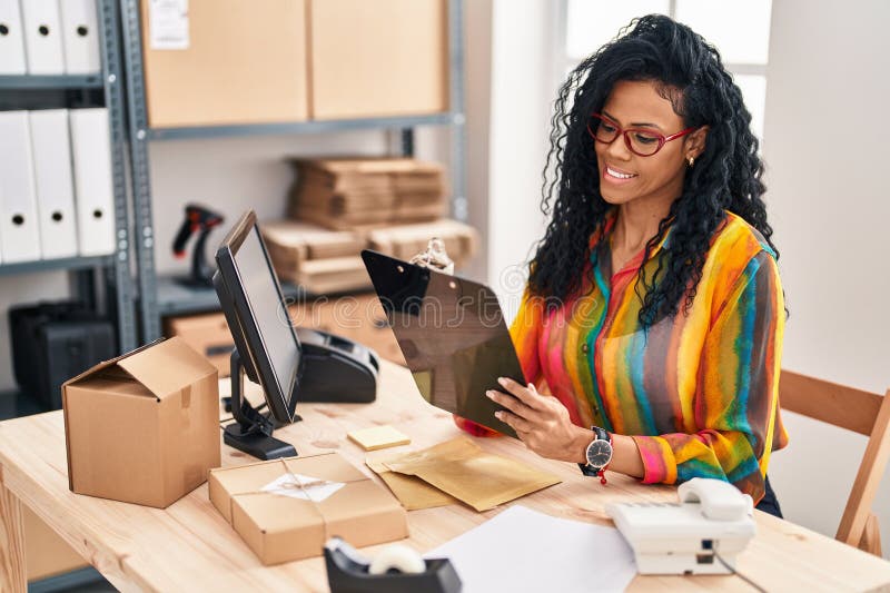 African American Woman Business Worker Writing on Document Working at ...