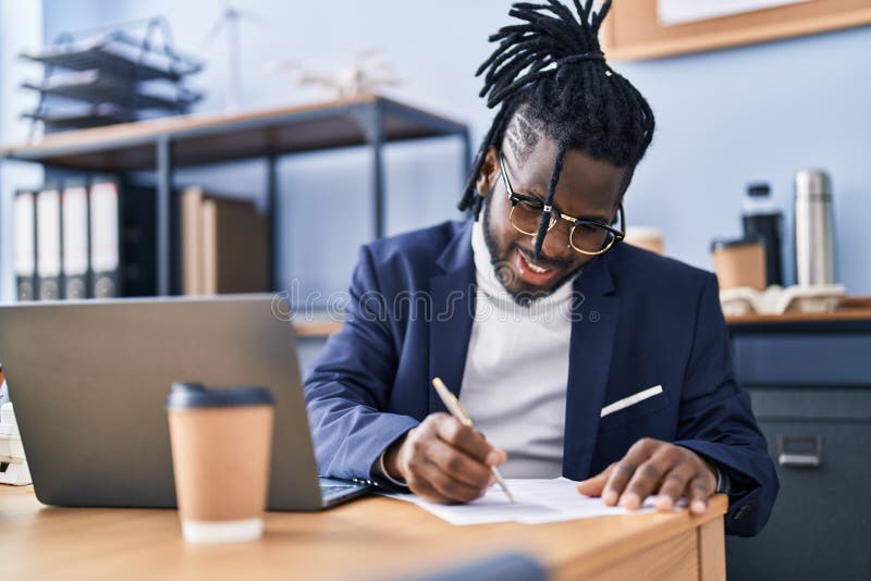 African American Woman Bussiness Worker Writing on Document Working at ...