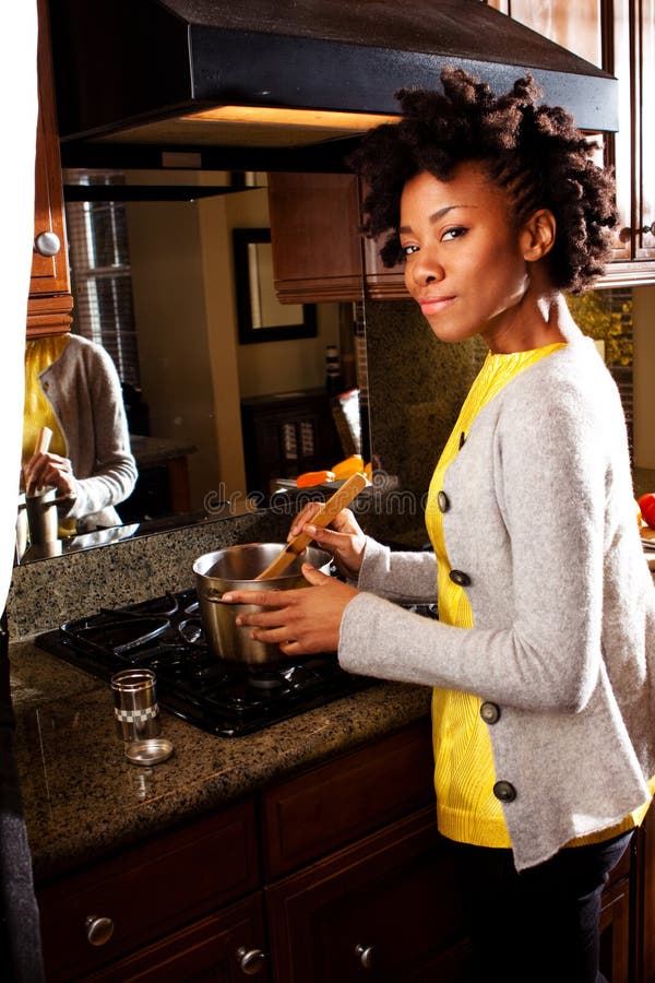 African American Woman Cooking in the Kitchen. Stock Photo - Image of ...