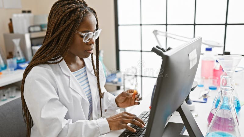 African American Woman in Lab Analyzing Sample Computer Research Scientist Glasses Stock Image ...