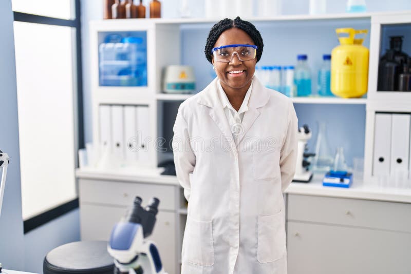 African American Woman Scientist Smiling Confident Standing at ... African American Woman Scientist Smiling Confident Standing at ...