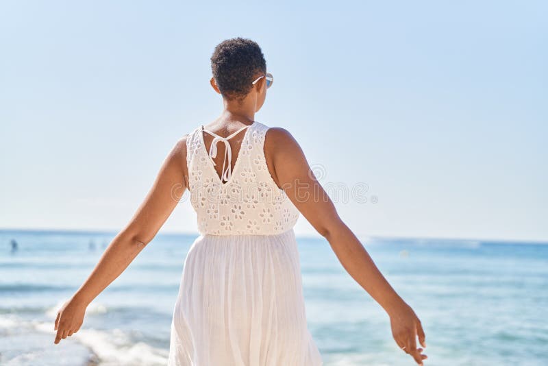 African American Woman Standing on Back View at Seaside Stock Image ...