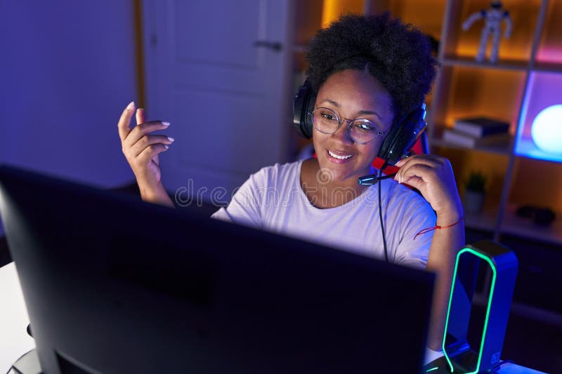 African American Woman Streamer Smiling Confident Having Video Call at ... African American Woman Streamer Smiling Confident Having Video Call at ...