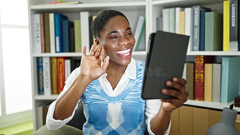 African American Woman Student Using Touchpad Having Video Call at ...