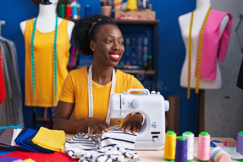 African American Woman Tailor Smiling Confident Using Sewing Machine at ...