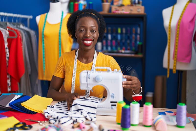 African American Woman Tailor Smiling Confident Using Sewing Machine at ...