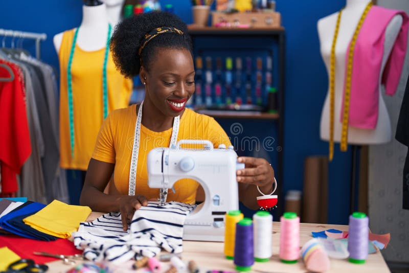 African American Woman Tailor Smiling Confident Using Sewing Machine at ...