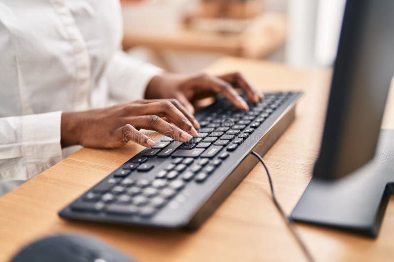 African American Woman Using Computer Keyboard at Office Stock Image ...