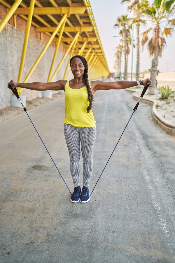 African American Woman Using Elastic Band Training at Street Stock ...