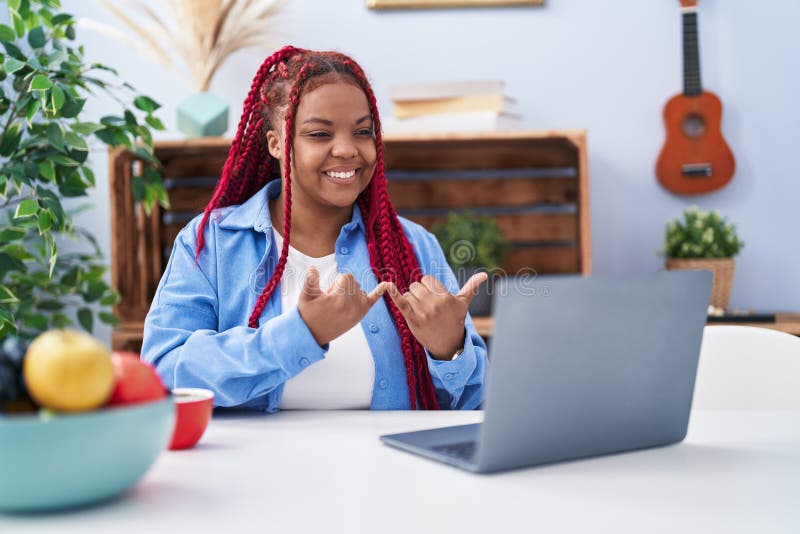 African American Woman Using Laptop Communicate with Deaf Language at ...