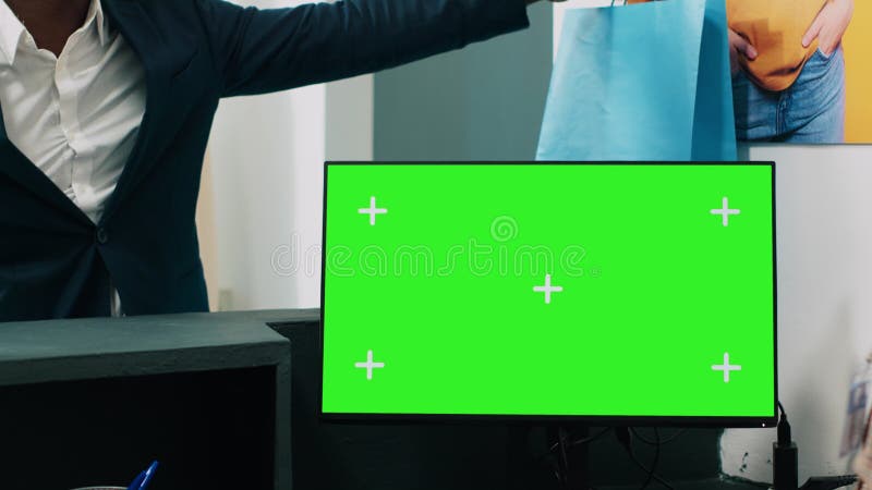 African American Worker Uses Computer with Greenscreen Display Stock ...