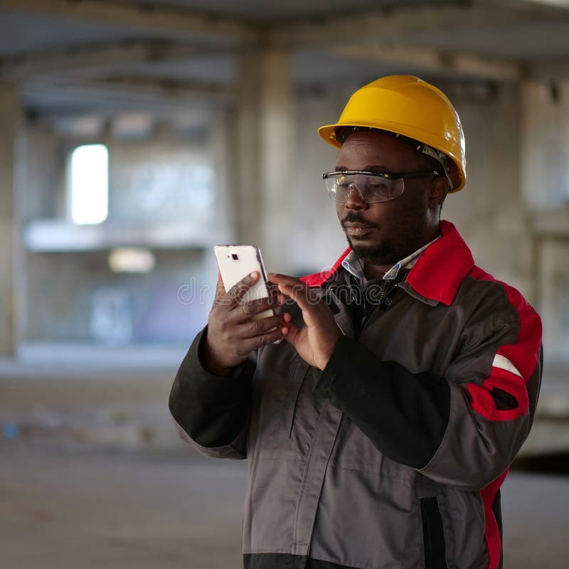 African American Workman Smartphone Construction Site Stock Photos ...