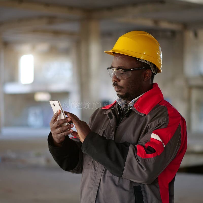 African American Workman Smartphone Construction Site Stock Photos ...