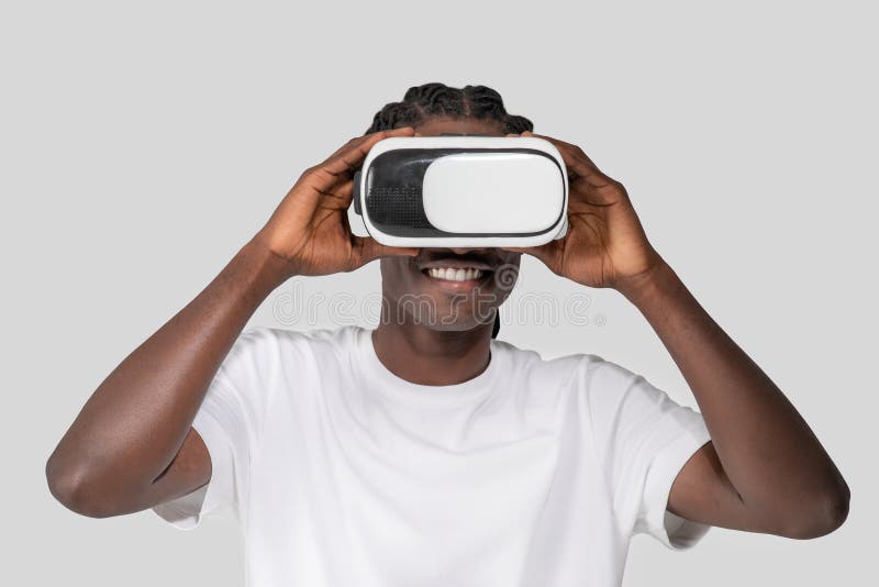 Man Exploring Virtual Reality with a Headset Stock Image - Image of ...