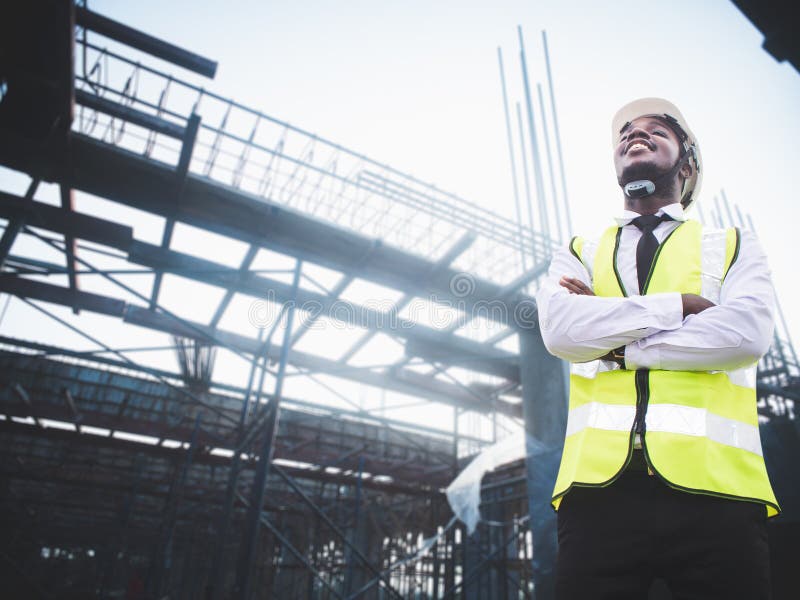 African Architects Engineer Man with Hardhat Work Together in the ...