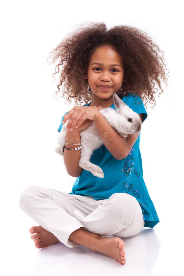African Asian Girl Holding a Rabbit Stock Photo - Image of animal, girl ...