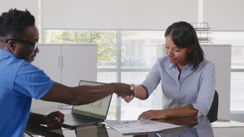 African Bank Agent and Caucasian Client on Successful Consultation ... African Bank Agent and Caucasian Client on Successful Consultation ...