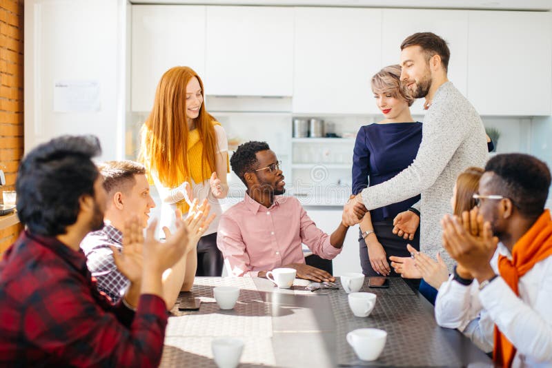 African Boss is Congratulating His Talented Worker in Front of ...