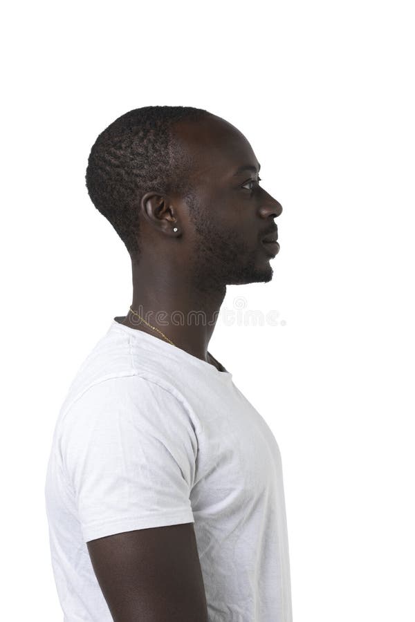 African Boy in Profile on a White Background Looks Straight Ahead Stock ...