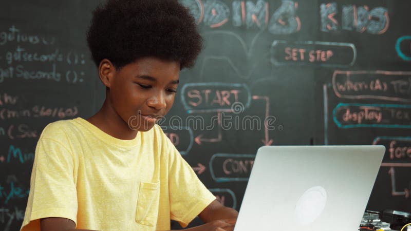 African Boy Programing System or Coding System by Using Laptop ...