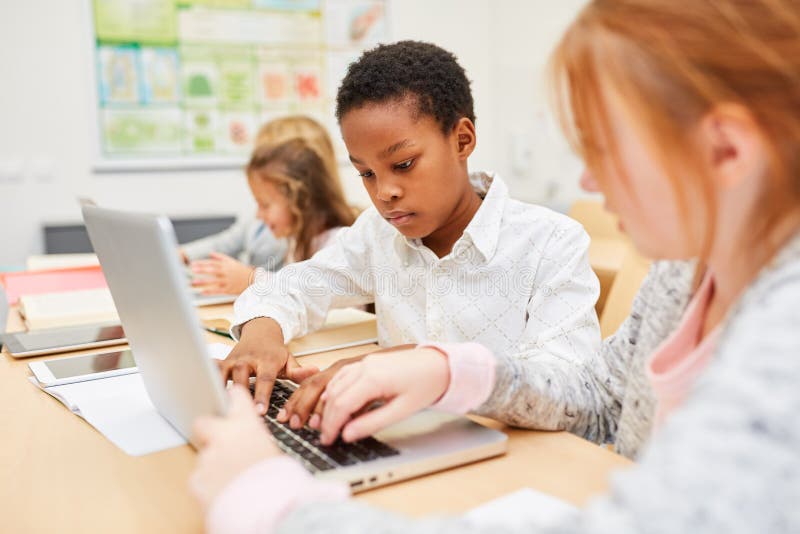 African Boy is Typing on the Laptop Stock Image - Image of lessons ...