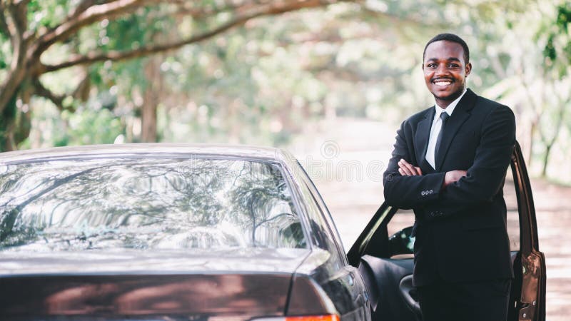 African Business Man in Suit Standing with Car.16:9 Style Stock Photo ...