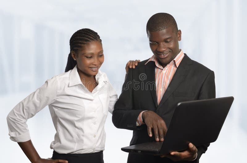 African Business Partner Work on Notebook Stock Photo - Image of ...
