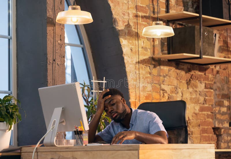African Businessman, Manager Working in Modern Office Using Devices and ...