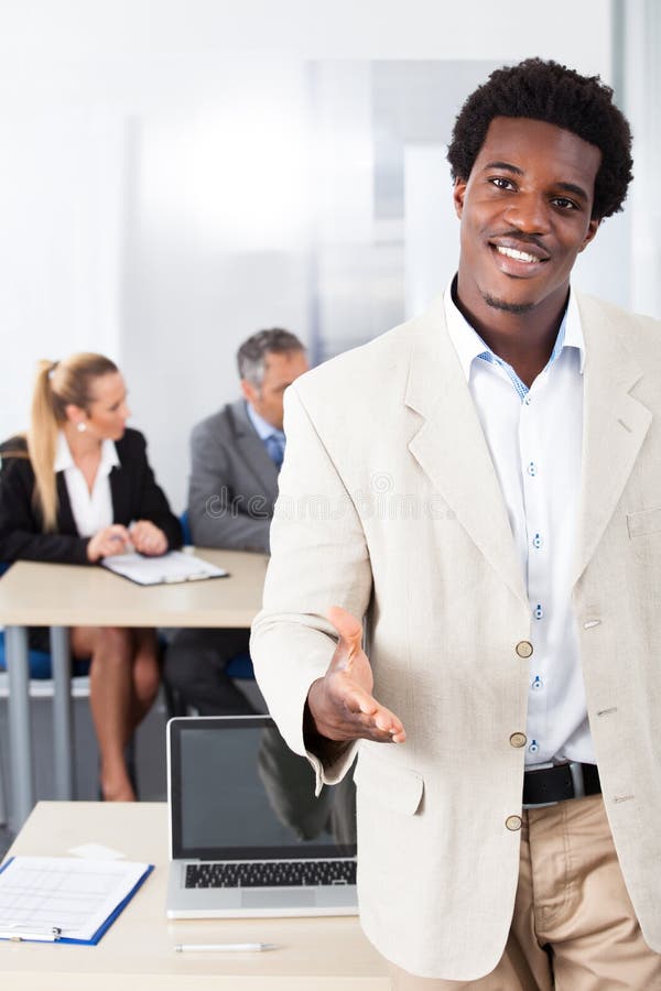 African Businessman Offering Handshake Stock Photo - Image of ...