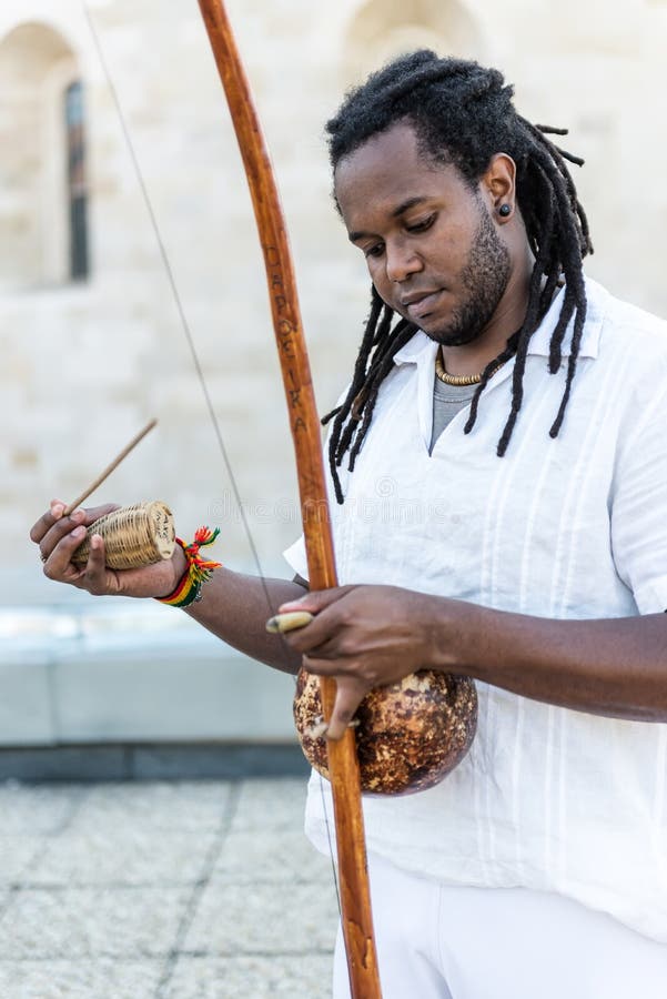 African Capoeira Rastaman,playing A Instrument Berimbau Stock Photo ...