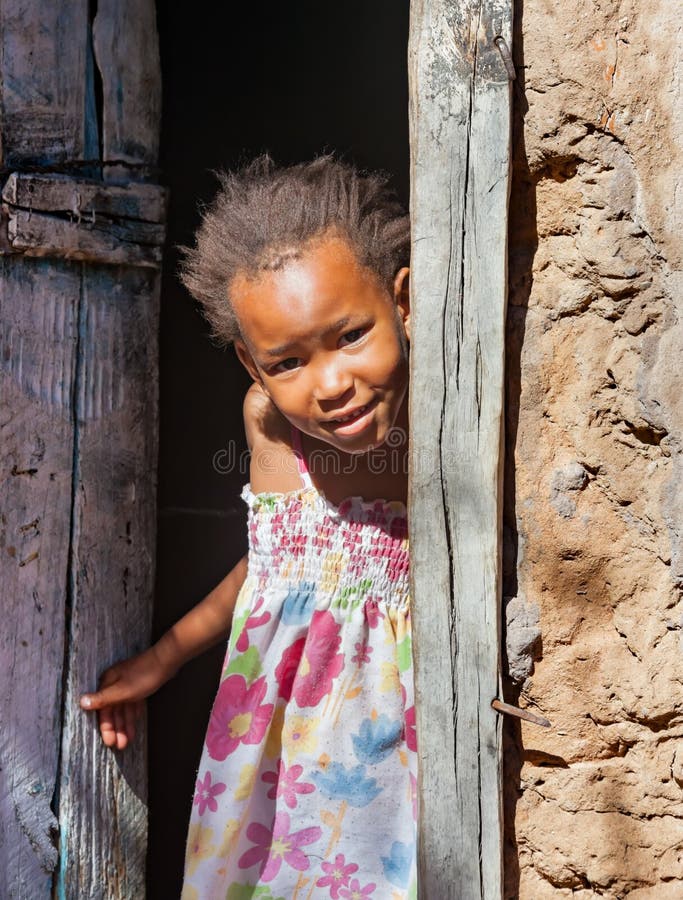 African child in a village stock photo. Image of floral - 164629662