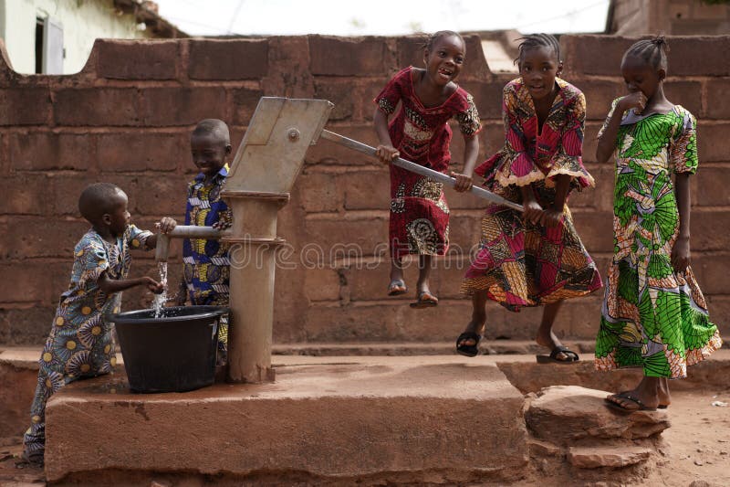 African Children Having Fun while Taking Water from a Hand Pump Stock ...