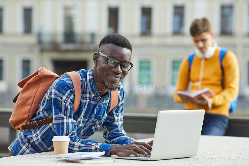 African College Student Posing Outdoors Stock Image - Image of glasses ...