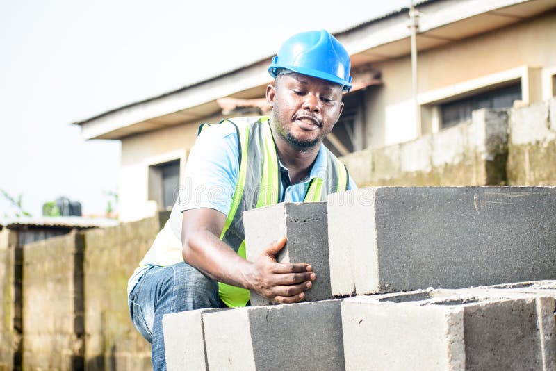African Construction Worker Wearing the Reflective Jacket while Working ...