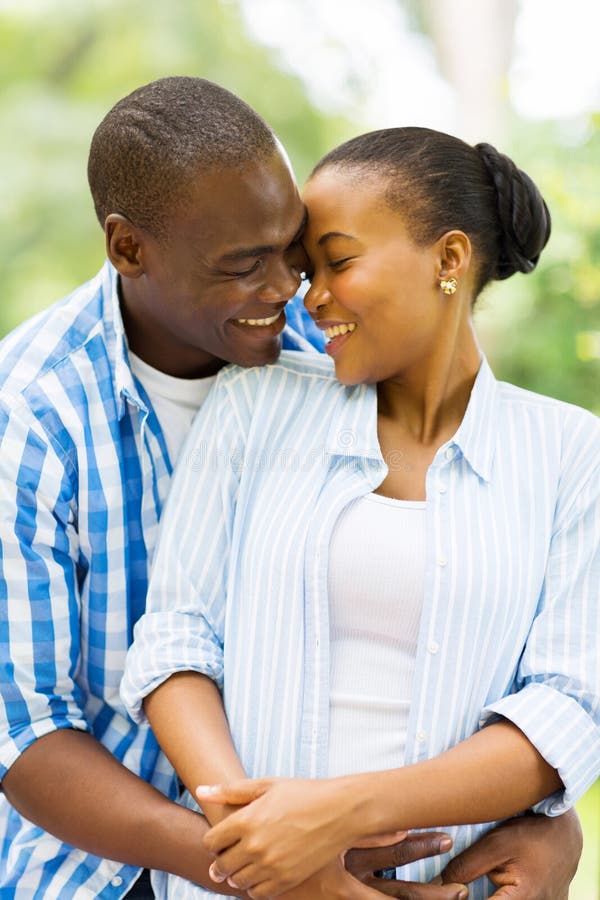 African couple hugging stock photo. Image of casual, cheerful - 40211272