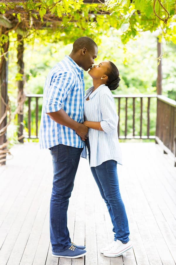 African couple kissing stock photo. Image of length, boyfriend - 40221744
