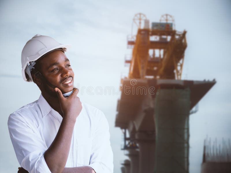 African Engineer Construction Worker in Helmet Thinking with Ideas and ...